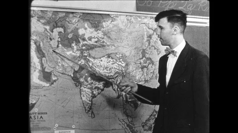 1950s: UNITED STATES: man in bow tie poi... | Stock Video | Pond5