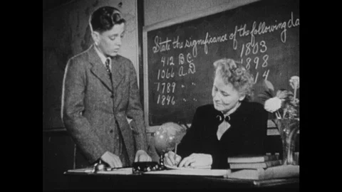 1950s: UNITED STATES: school teacher tal... | Stock Video | Pond5