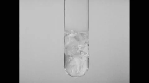 1950s: Water boiling in test tube. Close... | Stock Video | Pond5