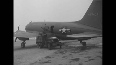 1951 - American soldiers pump DDT from b... | Stock Video | Pond5