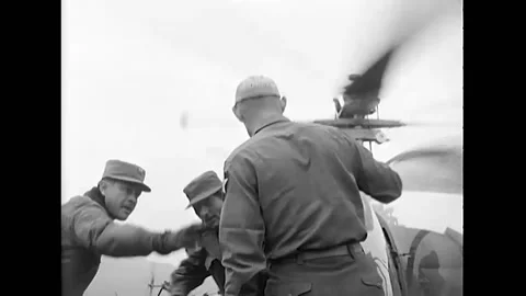 1951 - Danny Kaye arrives at Kimpo Air F... | Stock Video | Pond5