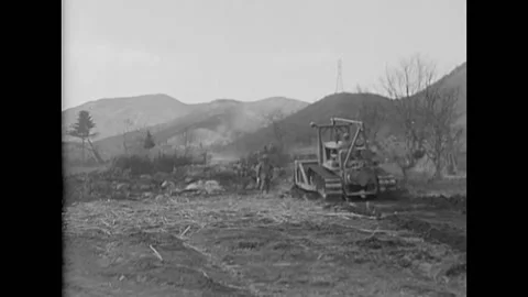 1951 - US Army engineers use a bulldozer... | Stock Video | Pond5