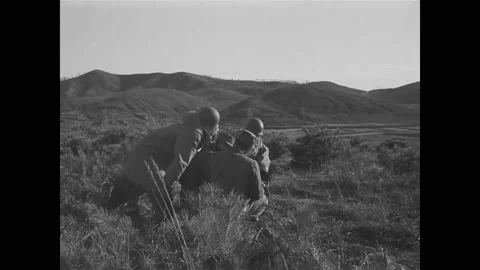 1951 - A US Army KMAG advisor speaks wit... | Stock Video | Pond5