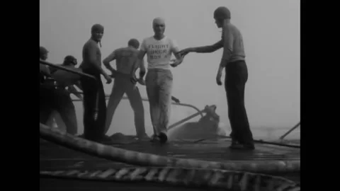 1951 - US Navy crewmen on the USS Midway... | Stock Video | Pond5