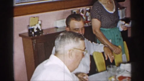 1955: men smoking at a dinner table NEW ... | Stock Video | Pond5