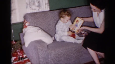 1959: a cute baby playing with his toys ... | Stock Video | Pond5