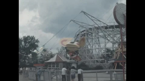 1960s: Amusement park. Roller coaster t... | Stock Video | Pond5