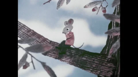 1960s: Animation, mouse pulling acorns f... | Stock Video | Pond5