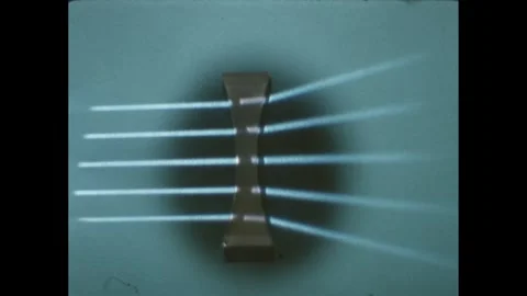 1960s: Beams of light being spread out b... | Stock Video | Pond5