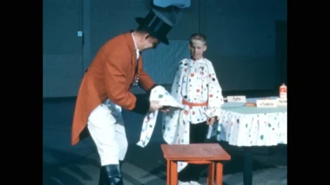 1960s: Boy beside table, Ringmaster brin... | Stock Video | Pond5