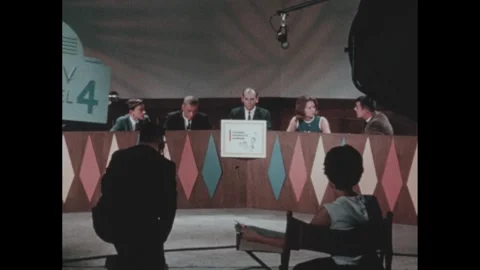 1960s: Cameras on TV set, zoom in on pan... | Stock Video | Pond5