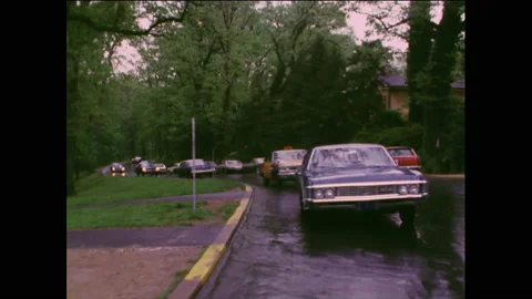 1960s: Cars drive in funeral procession ... | Stock Video | Pond5