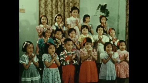 1960s: Children sing and dance in chorus... | Stock Video | Pond5