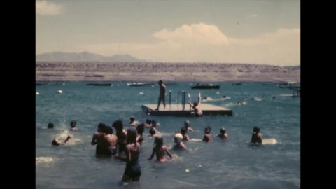 1960s: children swim, splash and play in... | Stock Video | Pond5