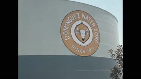 1960s: Cistern with logo on it. Water fl... | Stock Video | Pond5