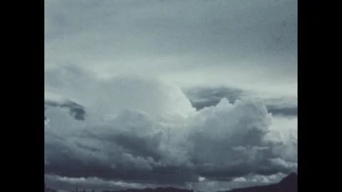 1960s: Clouds growing and moving across ... | Stock Video | Pond5