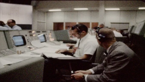 1960s: Control room. Men sit at compute... | Stock Video | Pond5