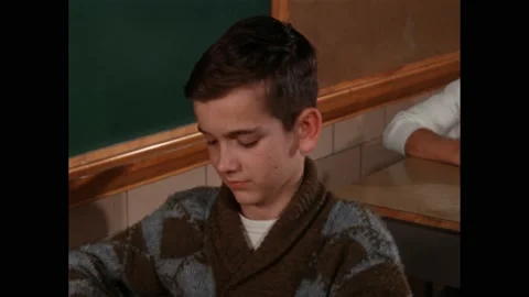 1960s: Coronet production slate. Boy loo... | Stock Video | Pond5