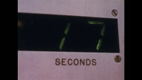 1960s: Countdown / Man looks at globe / ... | Stock Video | Pond5