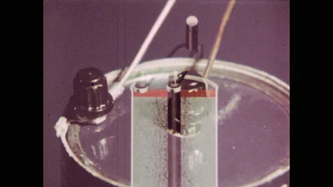 1960s: Dry cell battery. Animation of cr... | Stock Video | Pond5