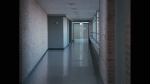1960s: Exit sign mounted to ceiling. Sch... | Stock Video | Pond5