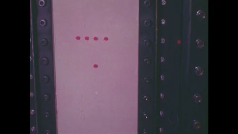 1960s: Five red dots on white boiler pla... | Stock Video | Pond5