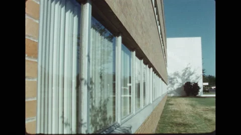 1960s: Long office building with windows... | Stock Video | Pond5
