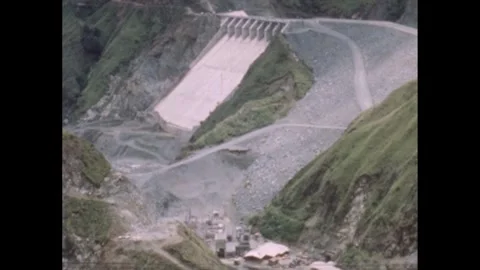 1960s: Long shot of dam under constructi... | Stock Video | Pond5