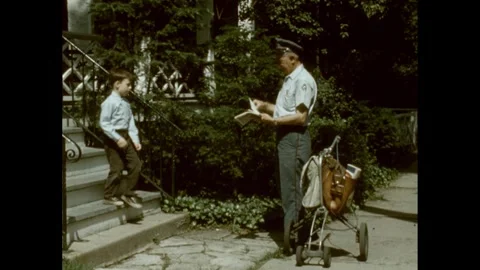 1960s: Mailman walking down street, give... | Stock Video | Pond5