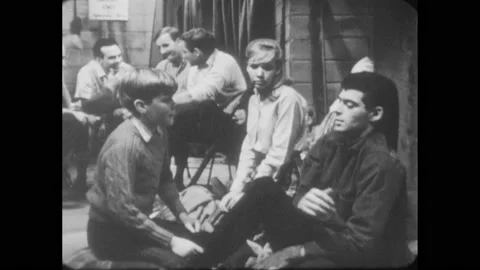 1960s: Man grabs a collapsing young woma... | Stock Video | Pond5