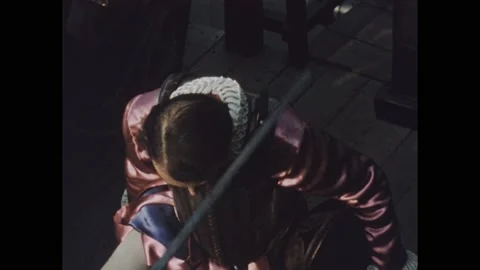 1960s: Man wears neck ruff, leather armo... | Stock Video | Pond5