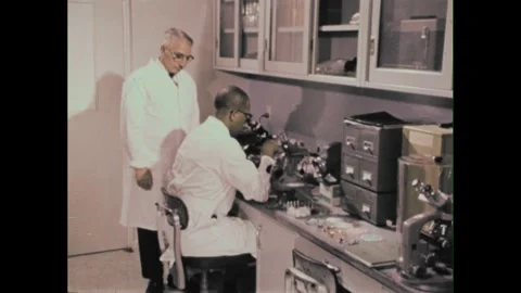 1960s: Man working with equipment in lab... | Stock Video | Pond5