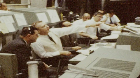 1960s: Men at control panel, man pointin... | Stock Video | Pond5