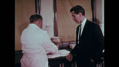 1960s: Men in lab, man sets down brain. ... | Stock Video | Pond5
