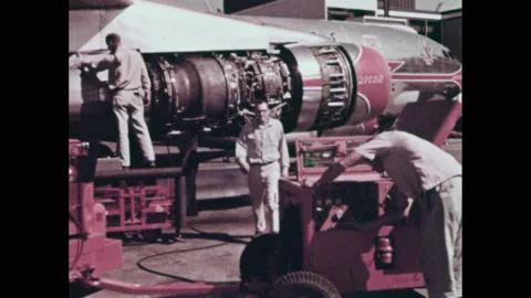 1960s: Men working on plane engine. Man ... | Stock Video | Pond5