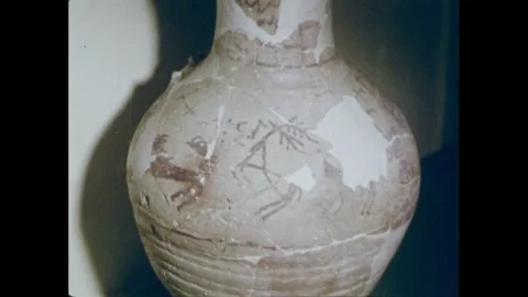 1960s: Metal figure of a God. Pottery ju... | Stock Video | Pond5