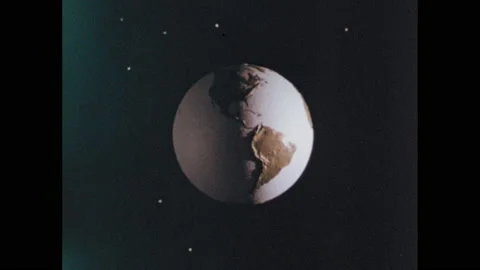 1960s: Model of Earth in space. Model ro... | Stock Video | Pond5