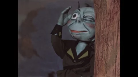 1960s: Monster puppet looks up at sky. C... | Stock Video | Pond5