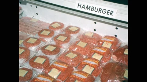 1960s: Packaged meat in display case, tr... | Stock Video | Pond5