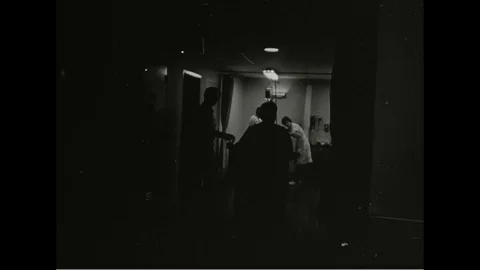 1960s - A patient is wheeled to the post... | Stock Video | Pond5