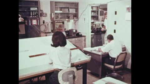 1960s: People work in office. Man walks... | Stock Video | Pond5
