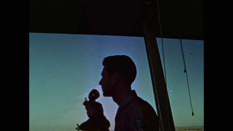 1960s: pilot in cockpit of plane, bomber... | Stock Video | Pond5