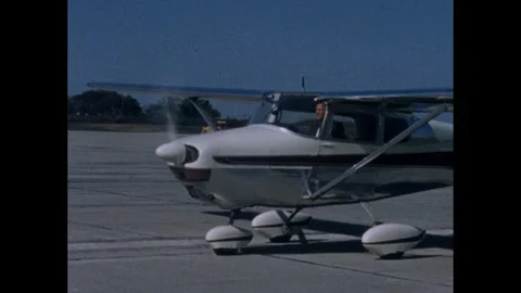 1960s: Pilot sitting in his small propel... | Stock Video | Pond5