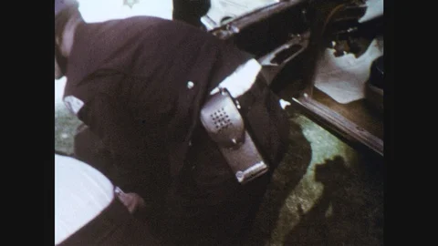 1960s: police officers in uniform and he... | Stock Video | Pond5