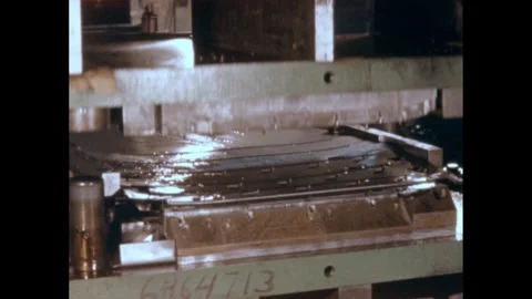 1960s: Punch press cuts forms from long ... | Stock Video | Pond5