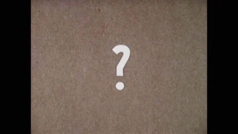 1960s: Question mark on a brown backgrou... | Stock Video | Pond5
