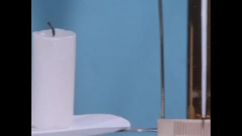 1960s: Scale. Finger points at weights.... | Stock Video | Pond5