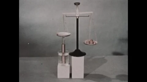 1960s: Scale with weights. Specific grav... | Stock Video | Pond5