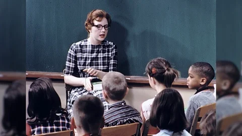 1960s Teacher Writes on Blackboard Stude... | Stock Video | Pond5