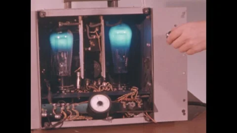 1960s: Two lightbulbs, tubes and wires w... | Stock Video | Pond5